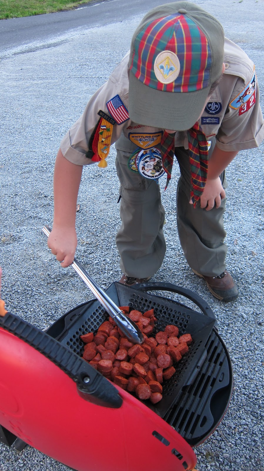Barbecue Master: Cub Scouts Enjoy Learning How to Grill Sausages