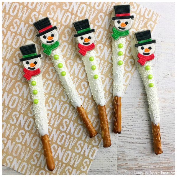 Learning and Exploring Through Play: Snowman Pretzel Rod Snacks