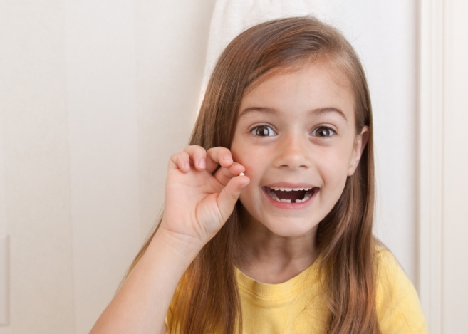 Easing Your Child’s Fear About Losing The First Tooth