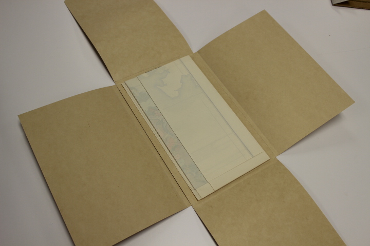 Speaking Volumes: A FOUR FLAP ENCLOSURE AND A PAMPHLET BOOKLET IN A ...