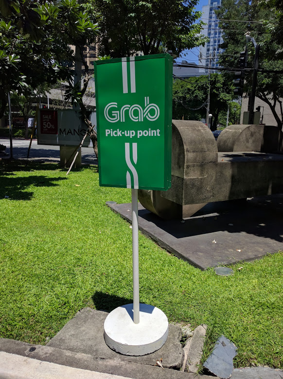黄金の日日: Grab Pick-up point