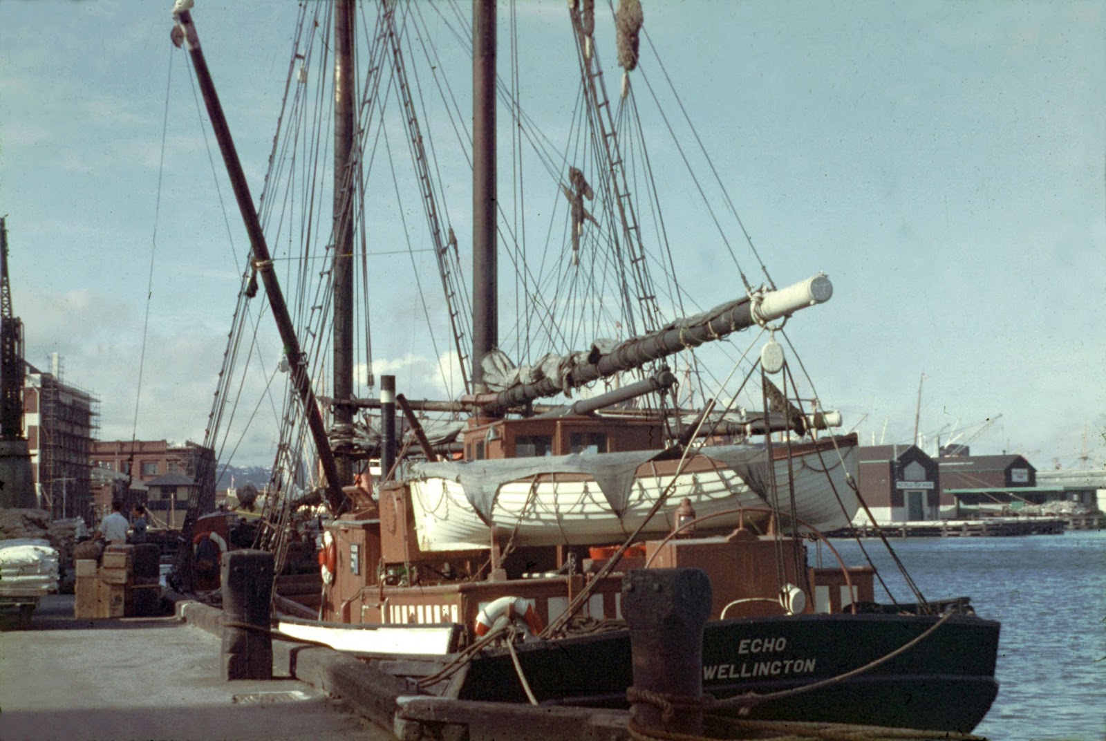 transpress nz: the scow 'Echo' at the Wellington wharves, 1950s