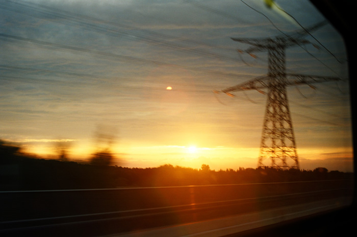 On My Way: Sunset through a train window