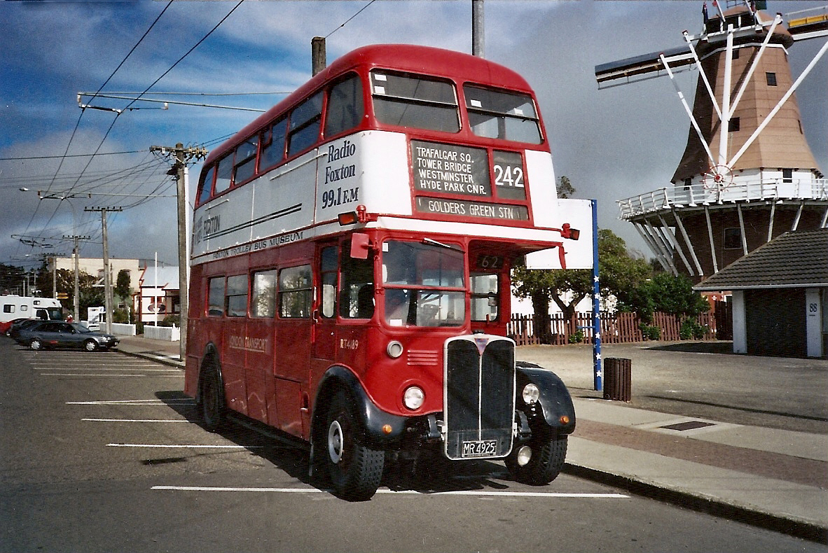 transpress nz: a London RT bus next to a Dutch windmill