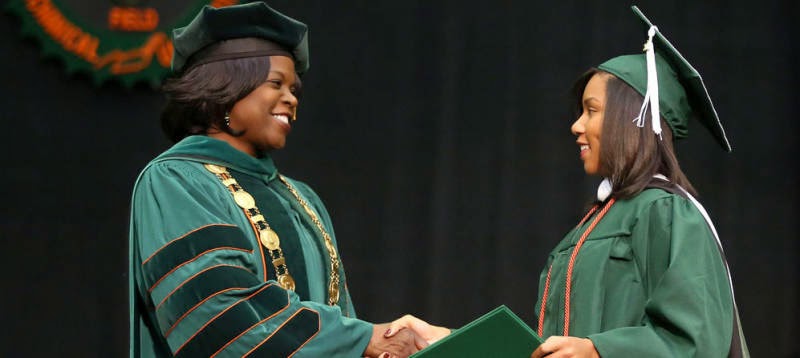 21 FAMU student-athletes cross stage at fall commencement