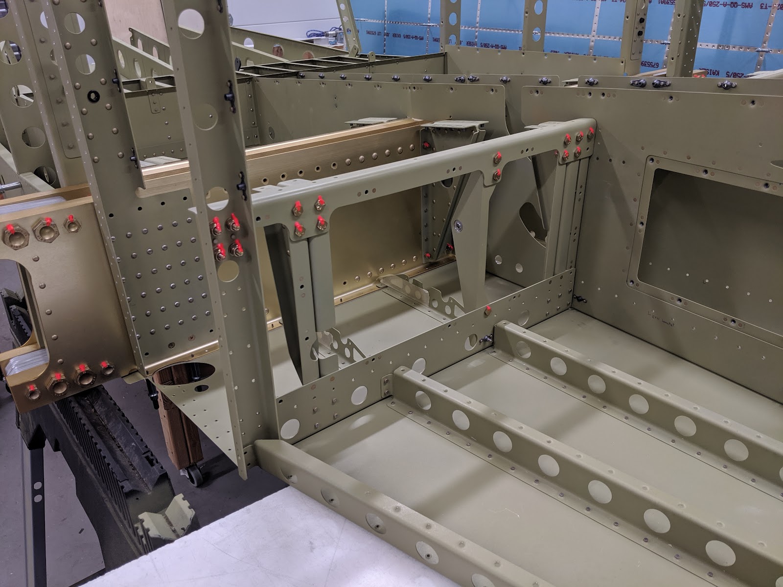 Damazio family's RV-10 project: Forward fuselage bottom skins riveted