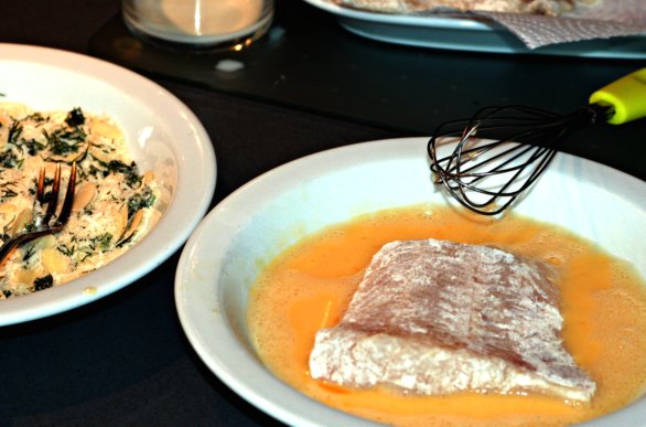 Sabor en cristal: Merluza rebozada con hierbas