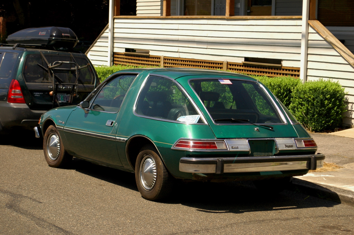 OLD PARKED CARS.: 1977 AMC Pacer D/L Hatchback.
