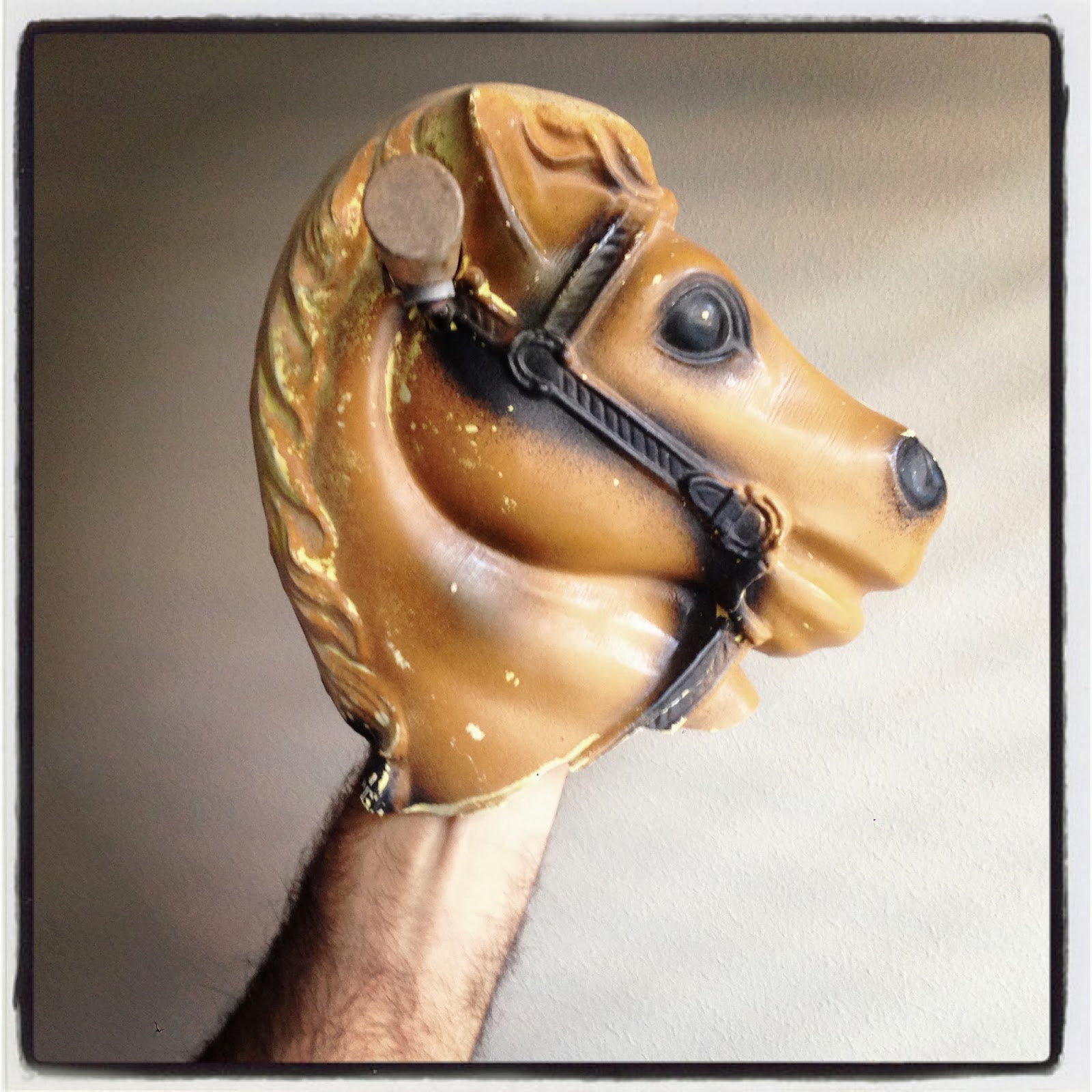 the adventures of poo-tail: rocking horse head
