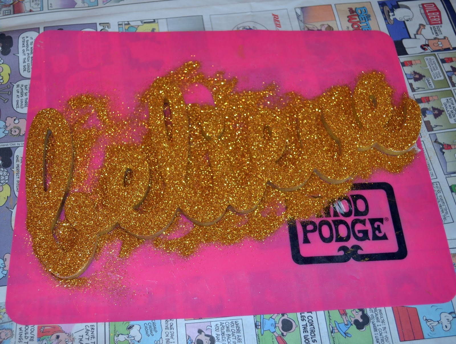 Gold glitter believe wood sign