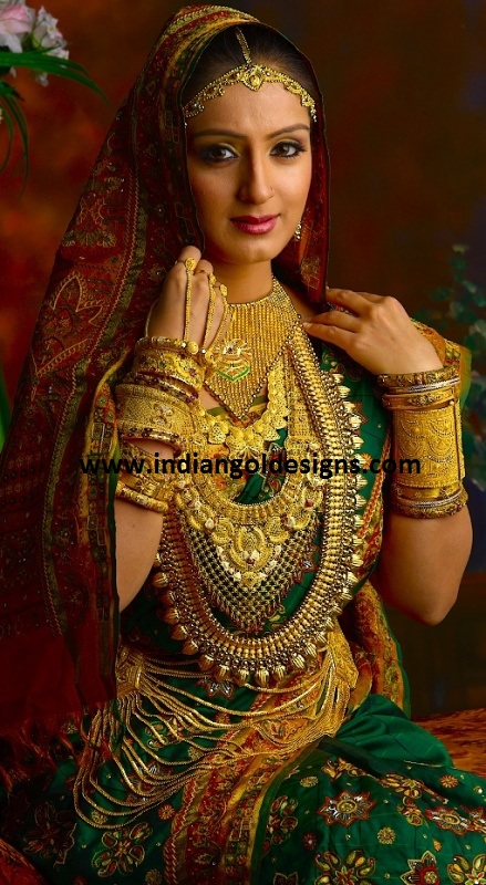 indiangoldesigns.com: Heavy gold 22k bridal jewellery from joy alukkas