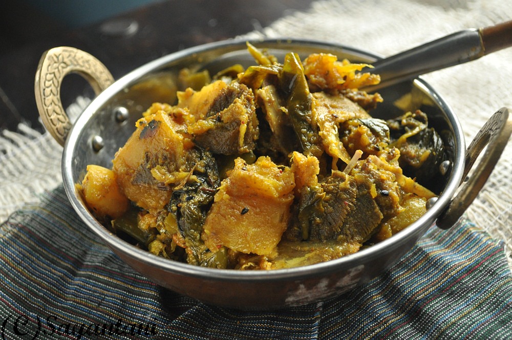 Ilish Macher Matha die Pui Shaaker chorchori (Malabar Spinach cooked ...
