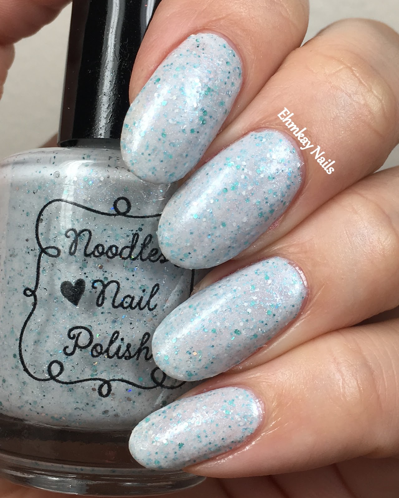 ehmkay nails: Noodles Nail Polish Rockefeller Rink with Snowflakes
