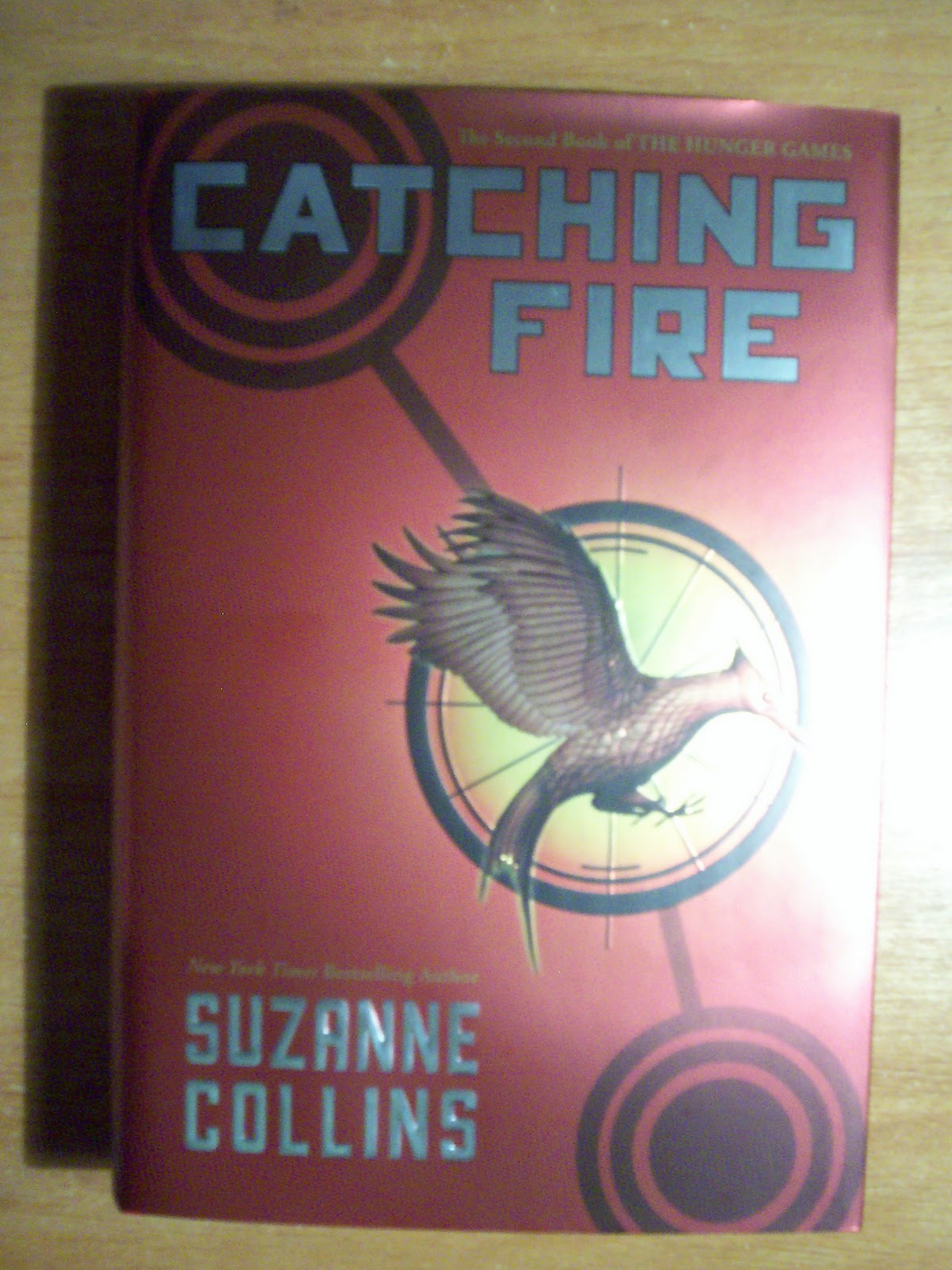 Door Stop Novels: Young Adult Fiction: Catching Fire by Suzanne Collins