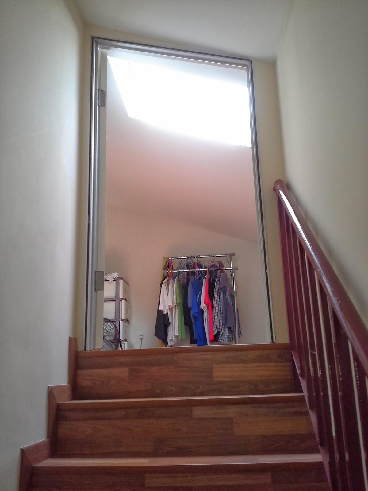 Attic room with extended permanent stairs and modular bathroom