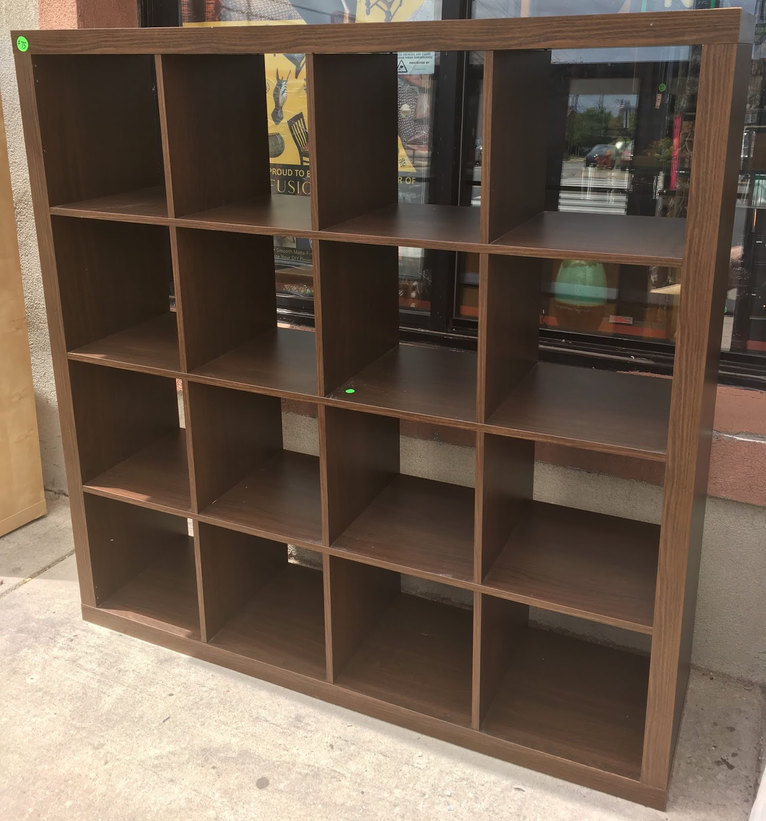 Uhuru Furniture & Collectibles: Brown 4 x 4 Cubby Shelf - $75 #451335 SOLD
