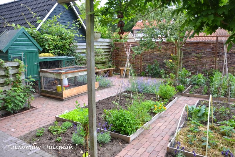 Tuindesign: Tuinontwerp voor een moes- en siertuin van Tuinvrouw Huisman