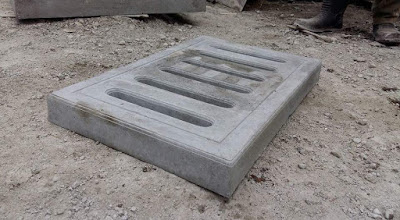 PRECAST COMPRESSED SLAB / CONCRETE GRATING: COMPRESSED CONCRETE SLAB