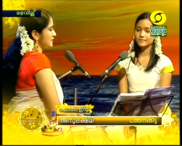 playback singer akhila anand in set saree cute images