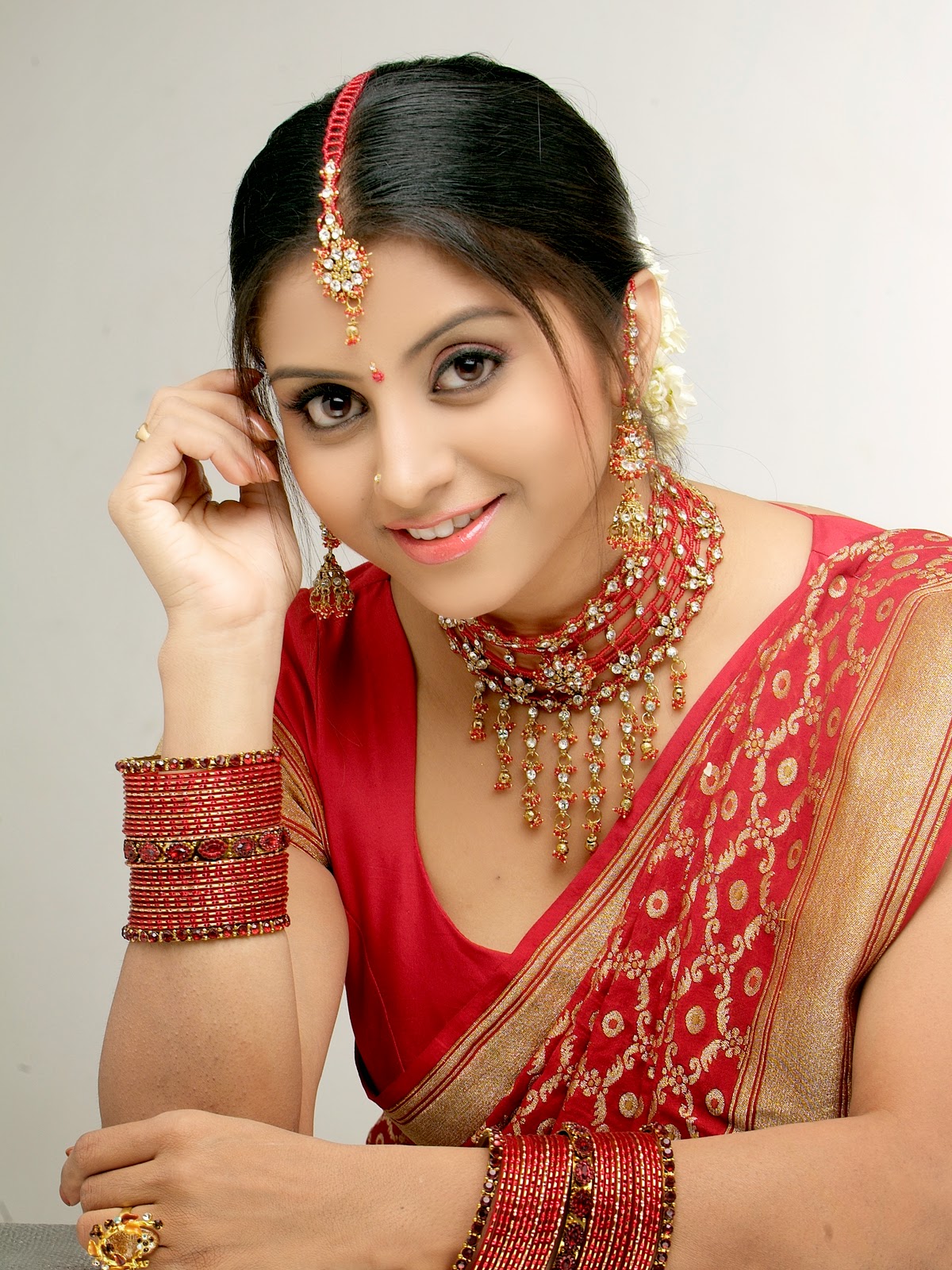 Actress Sunitha Varma Latest Cute Red Saree Stills - Cine Gallery