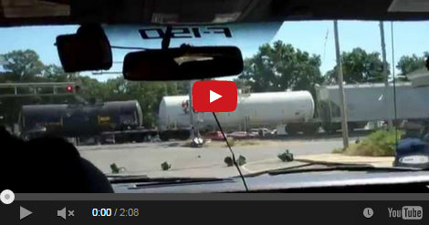 OVERSIZE TRUCK LOAD STUCK ON TRAIN TRACKS GETS HIT BY TRAIN | MagOne 2016