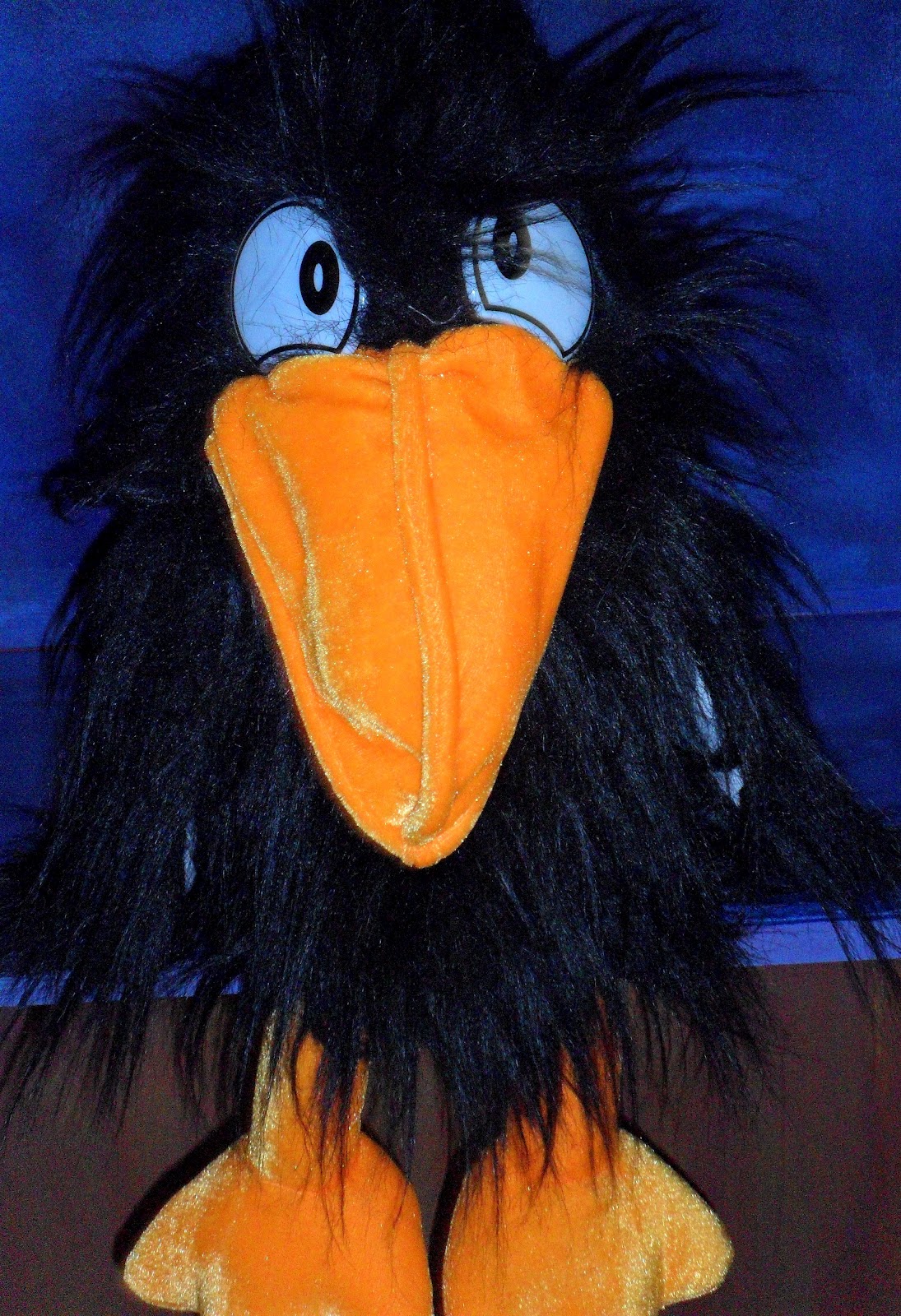 Beyond the Book Storytimes: Raven with puppet and people