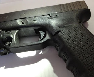 Gun News Blog: Tango Down shows photo of Gen4 Glock Vickers mag release