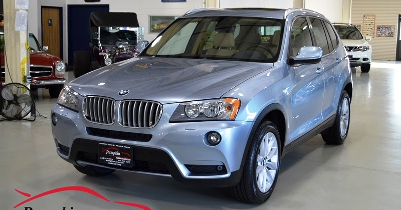This Blue Water on Sand Beige BMW X3 will have you entranced!!