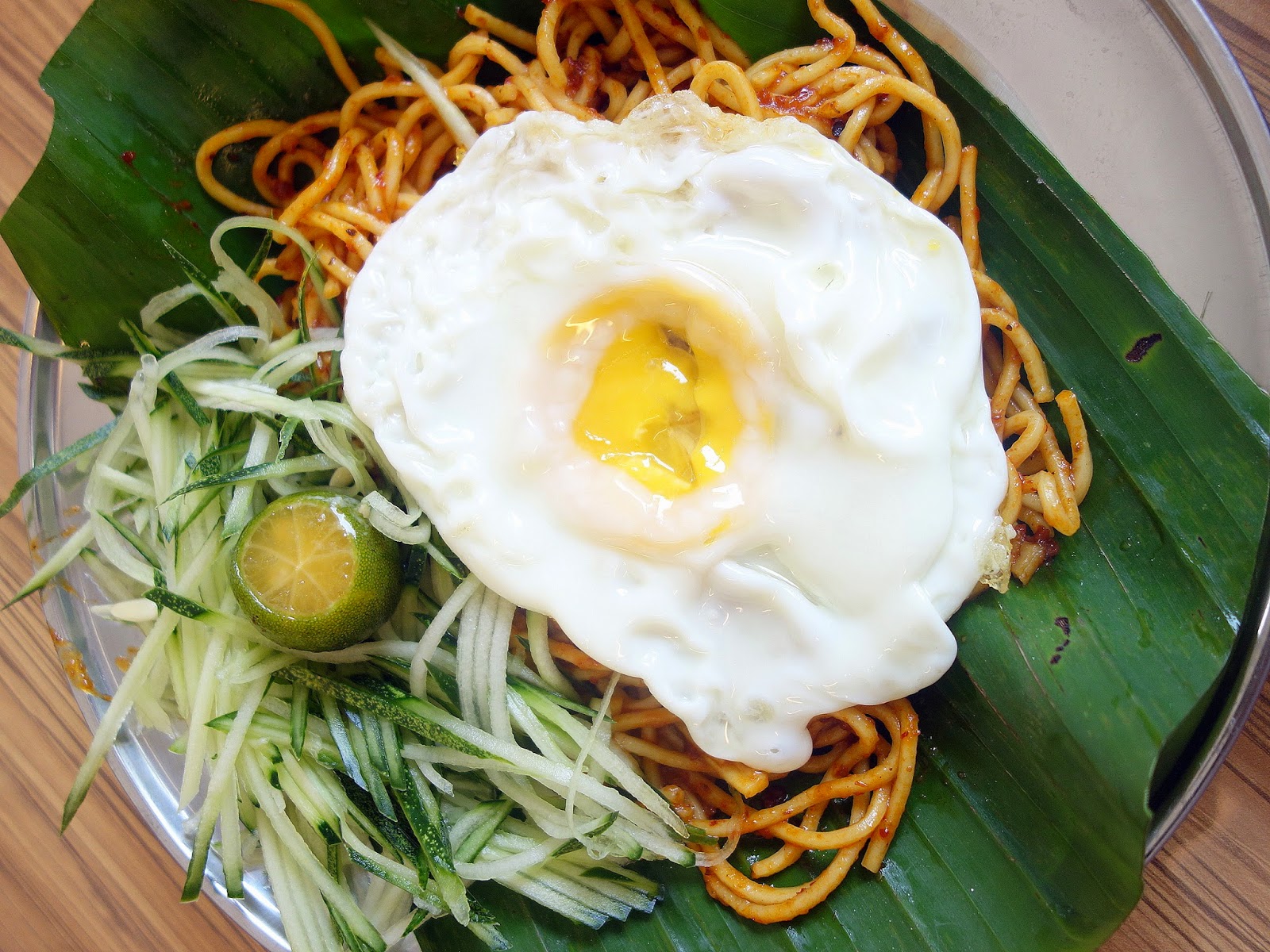 Main meals are equally well-priced. The Mee Goreng Sejuk is served nice ...