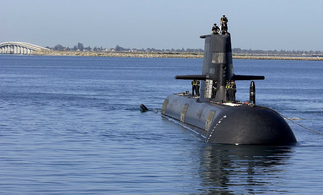 DEFENSE STUDIES: HMAS Farncomb Celebrates Successful Sinking at RIMPAC