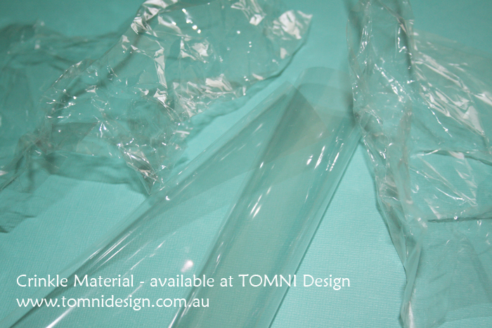 TOMNI design n two green pears: Flexible mirror material and Crinkle ...