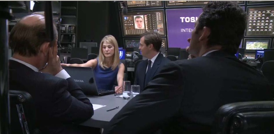 Watch a 'Johnny English Reborn' featurette and a new still of Rosamund Pike