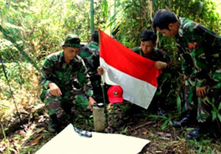 Garuda Militer: Yonif 100/Raider Jaga Patok Perbatasan Indonesia Malaysia