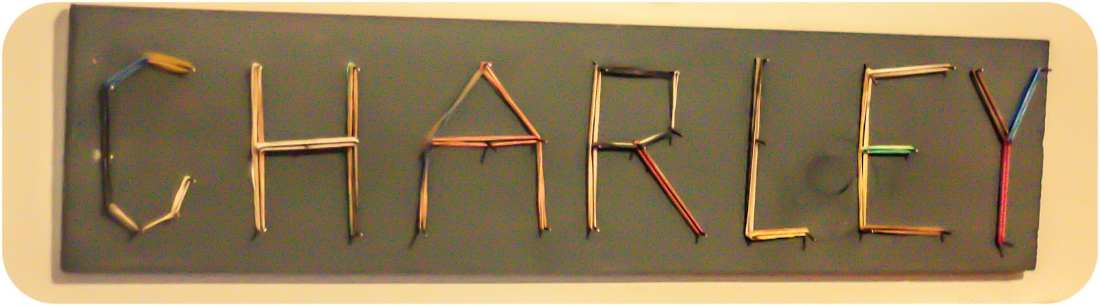 Rubber Band Art | Holding the World in a Paper Cup