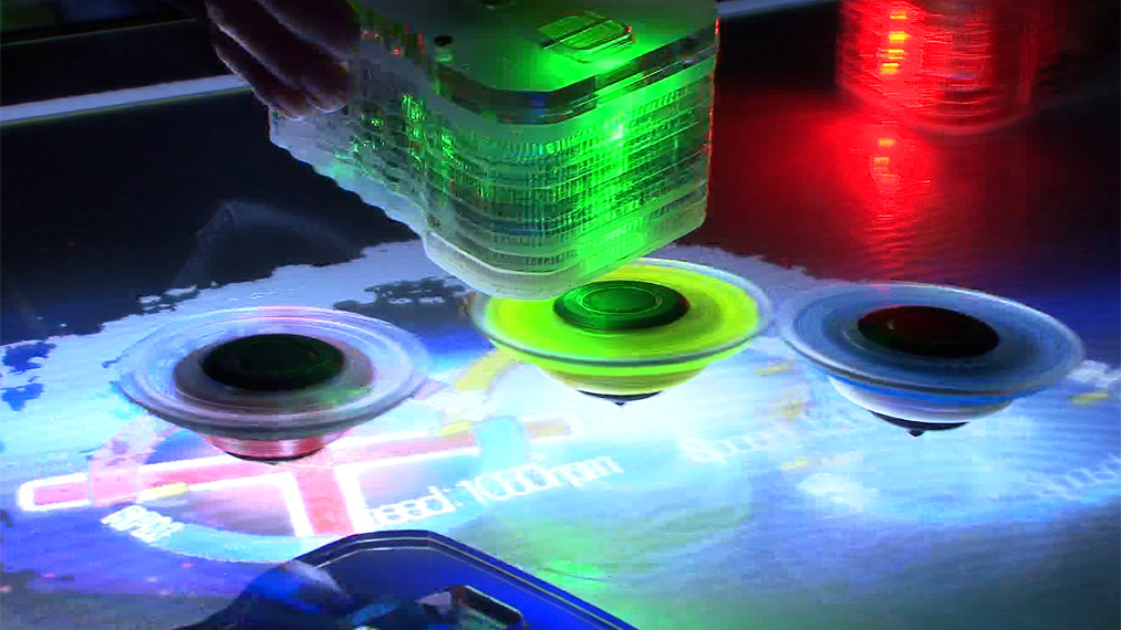 Next-Generation Spinning Top Game Uses Table-Top Display and Tactile ...