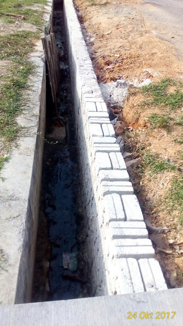 Kerja membaikpulih longkang taman bertam impian