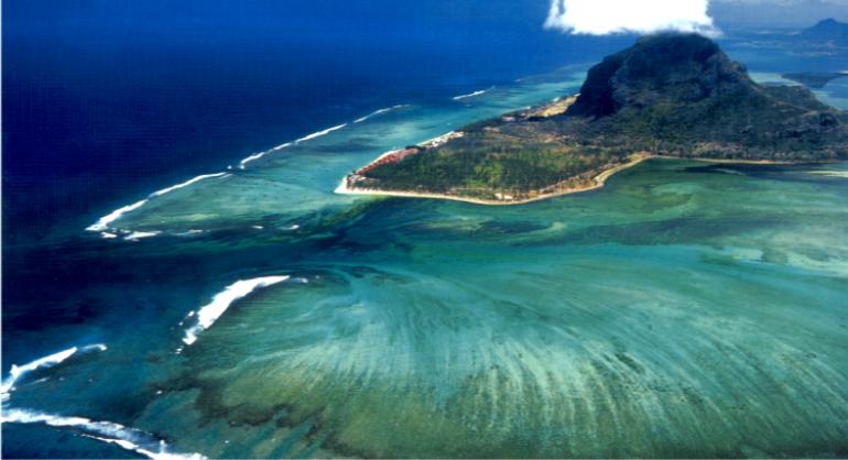 Aerial illusion of an underwater waterfall off of Mauritius Island : r/Blue