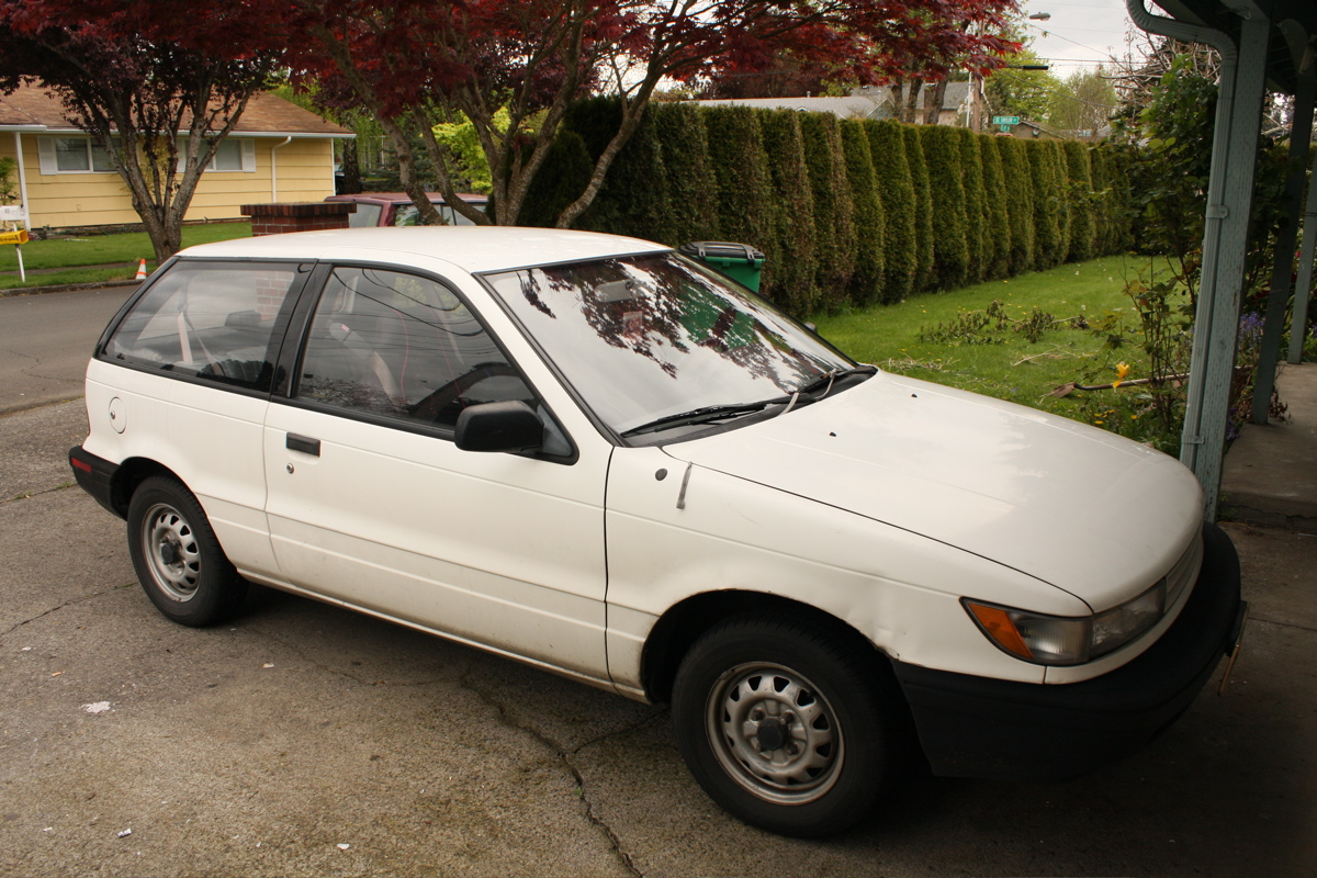OLD PARKED CARS.: Colt Cult: 1992 Plymouth Colt Hatchback...