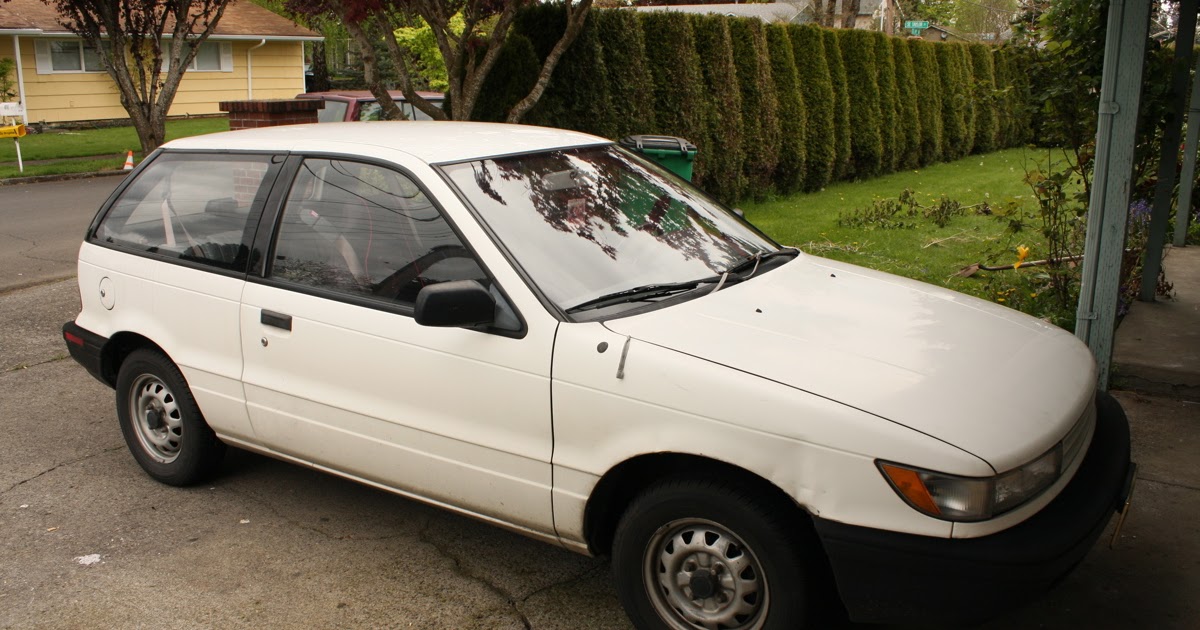 OLD PARKED CARS.: Colt Cult: 1992 Plymouth Colt Hatchback...