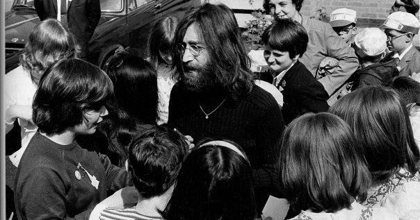 Meet the Beatles for Real: Fans crowd around John