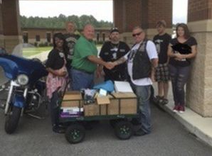 Iron Order Motorcycle Club donates school supplies - Outlaws Bikers News