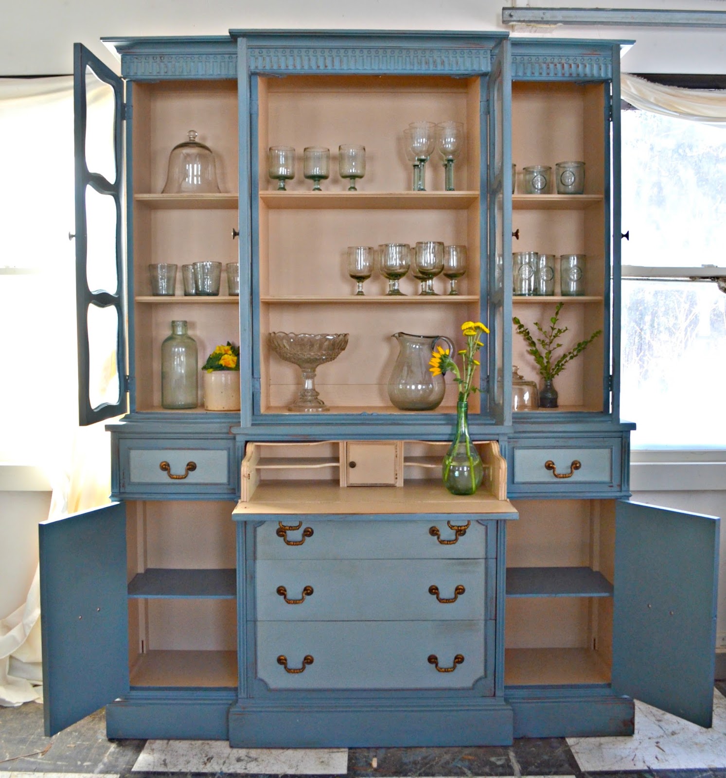 Heir and Space: A Unique Mahogany hutch with 'Correct Interiors'