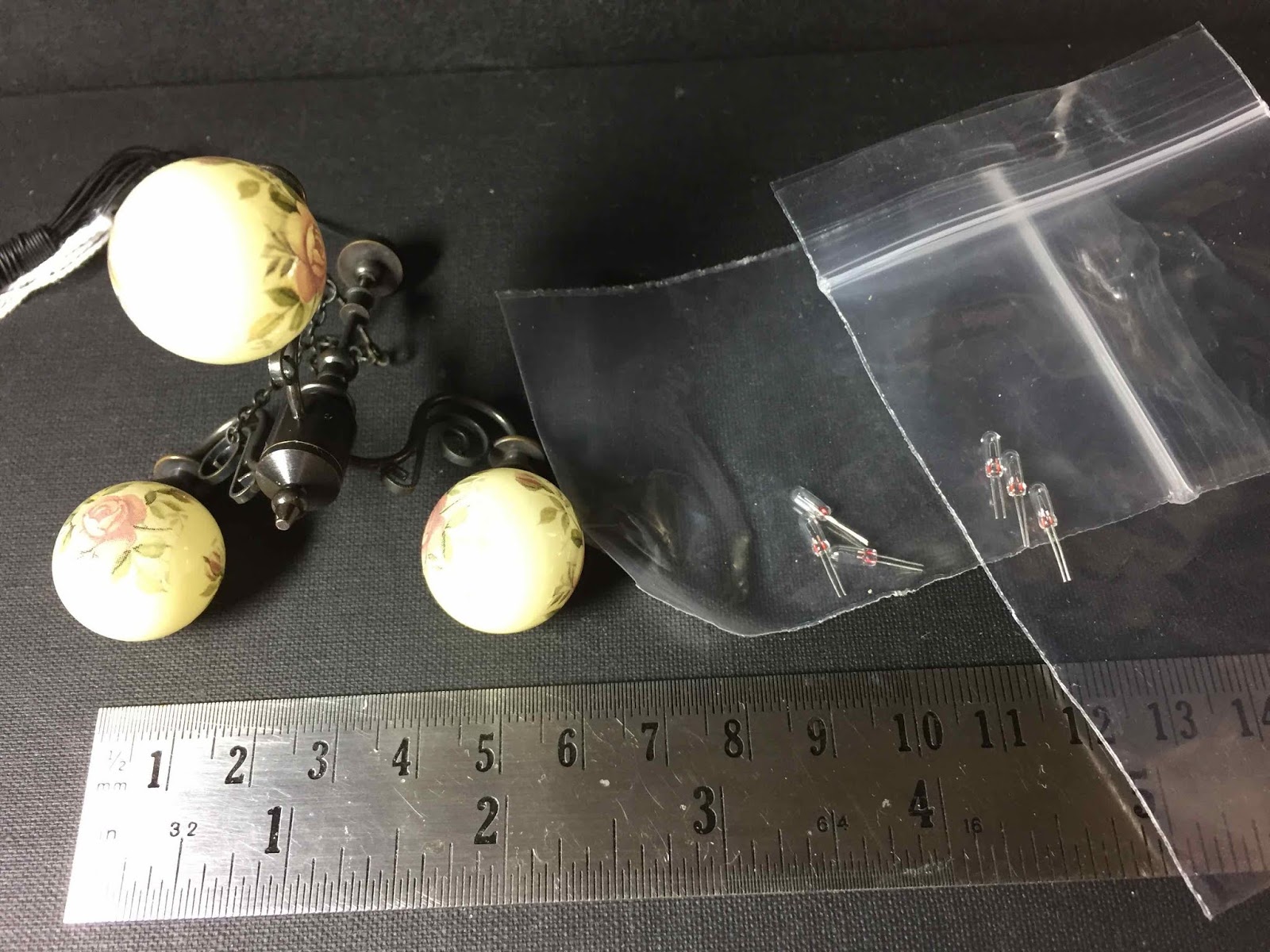 Ray Storey three arm pendant lights