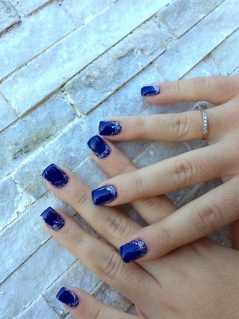 Set of tip extensions for length then a LED polish manicure in 'manic ...