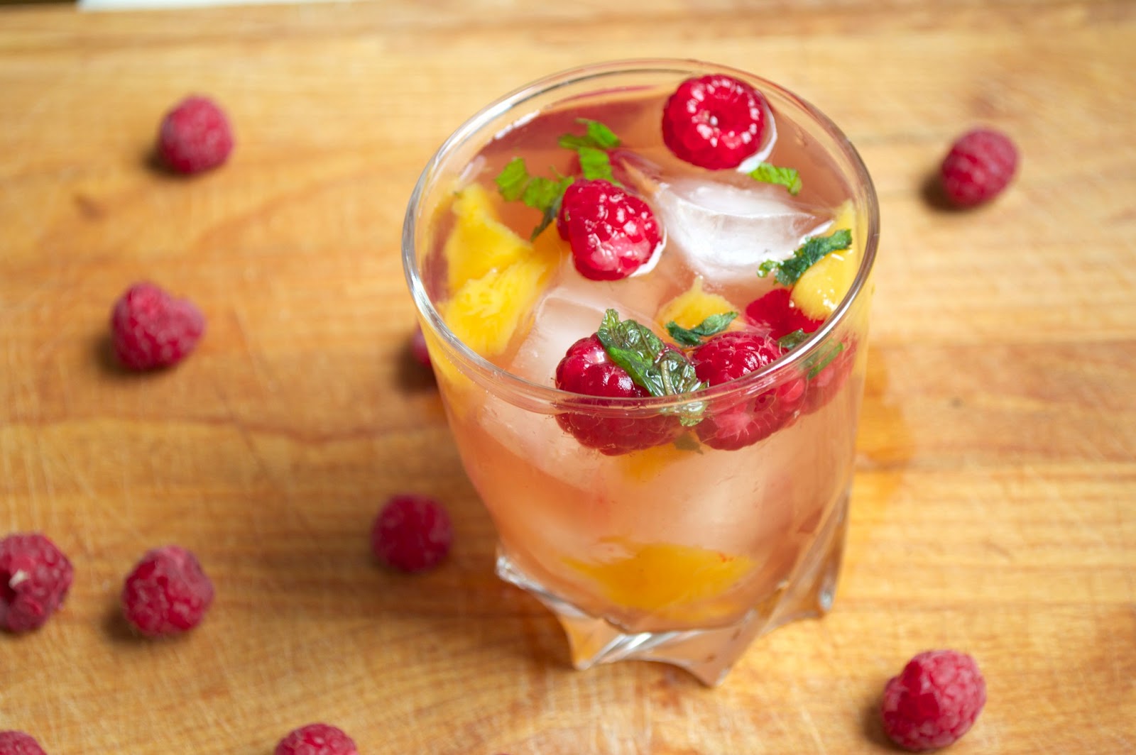 The Secrets of Living: Peach-Mango Iced Tea with Raspberries and Mint