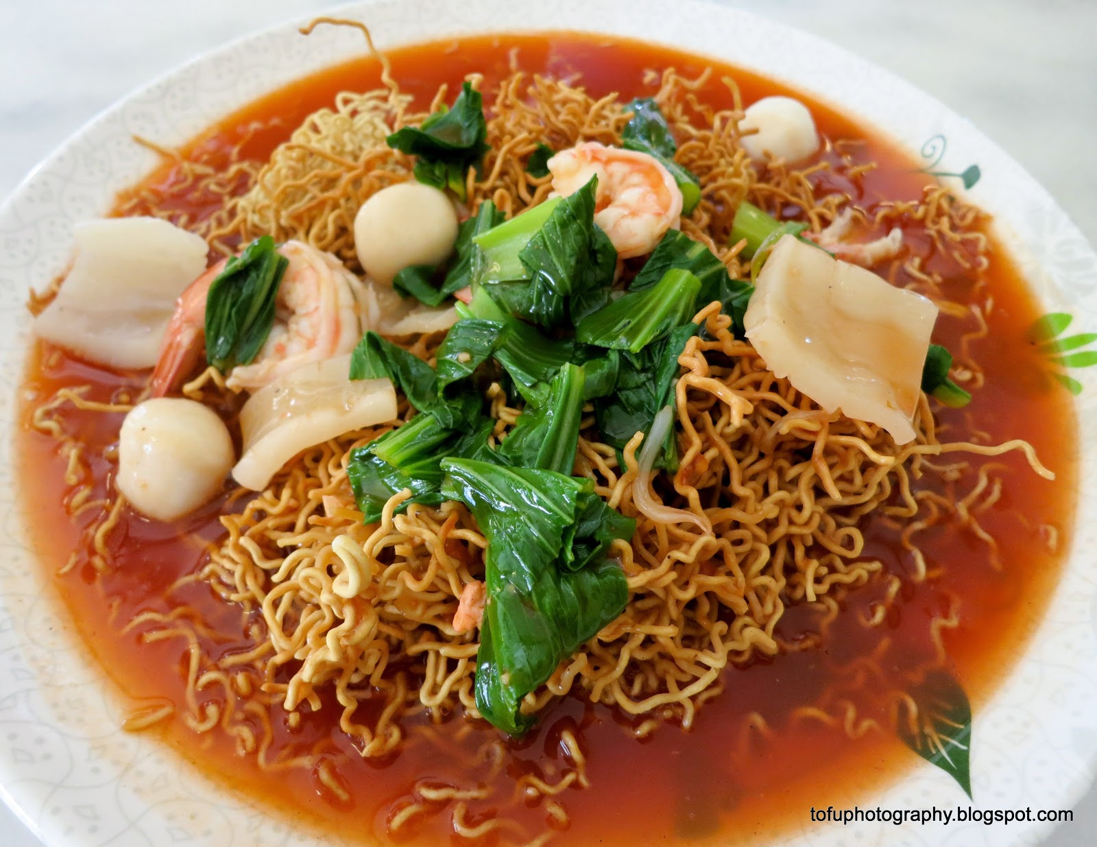 Tofu Photography: Seafood crispy Mee with tomato at a restaurant in ...