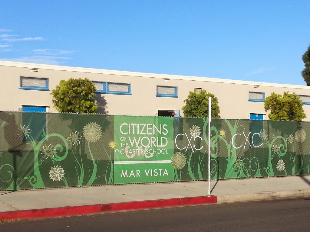 Adventures in Charter School Co-location: CWC fence covering removed