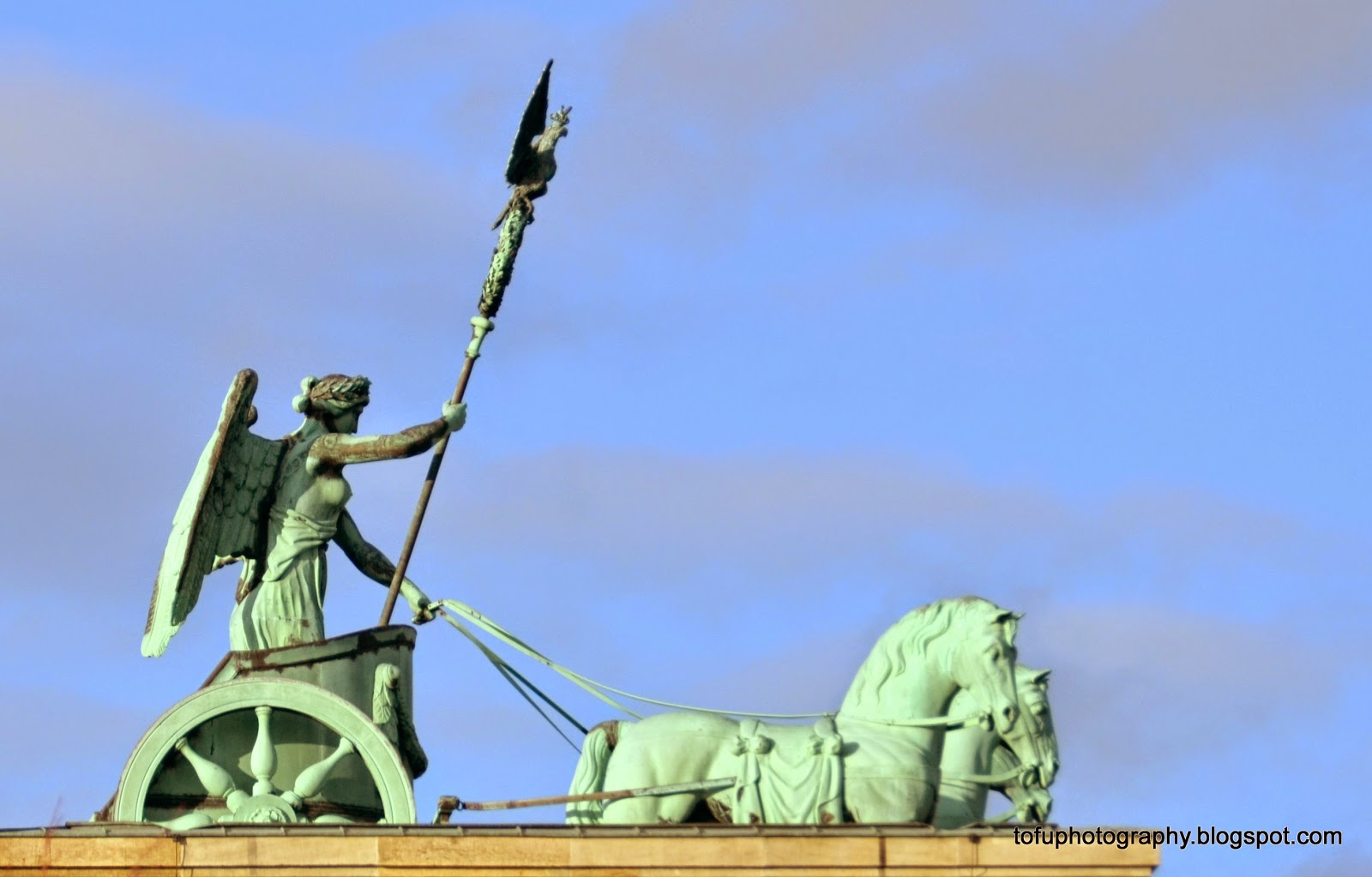 Tofu Photography: Statue of a woman in a chariot atop a building in ...