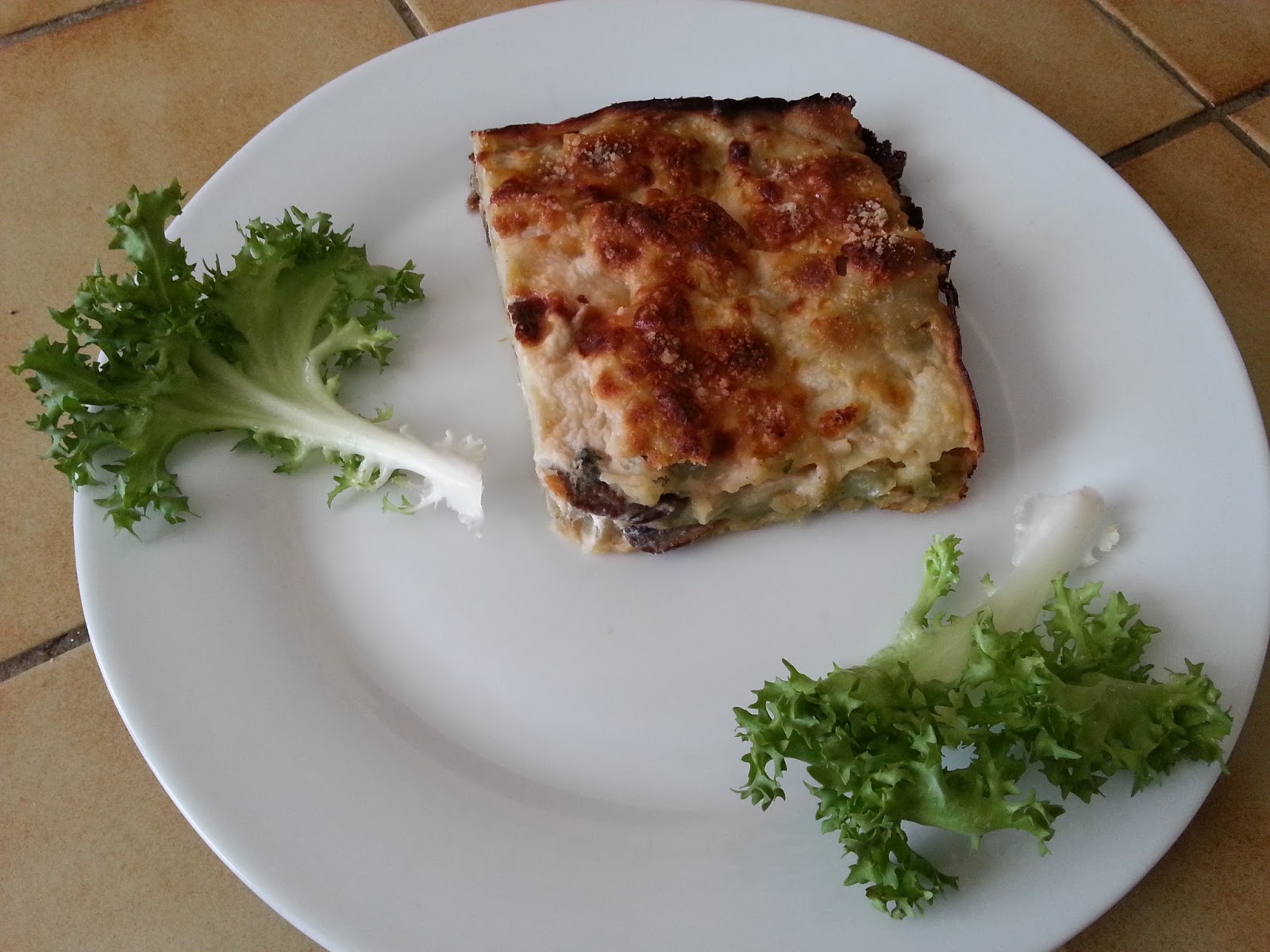 Cuisine: Gratin de ravioles aux champignons de Paris