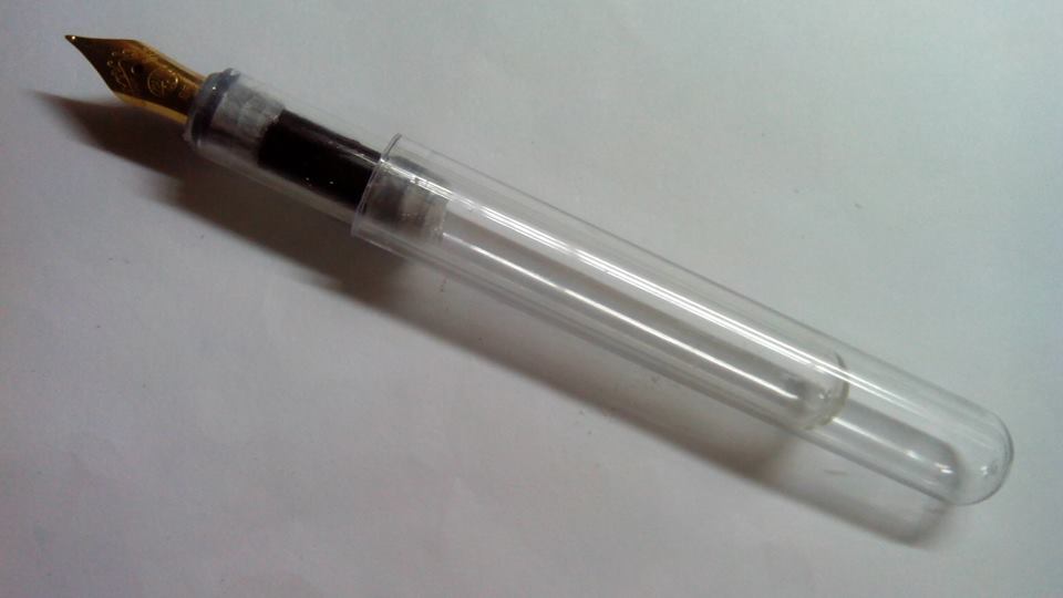 Pen Vault and Ink Cellar.: glass body fountain pen